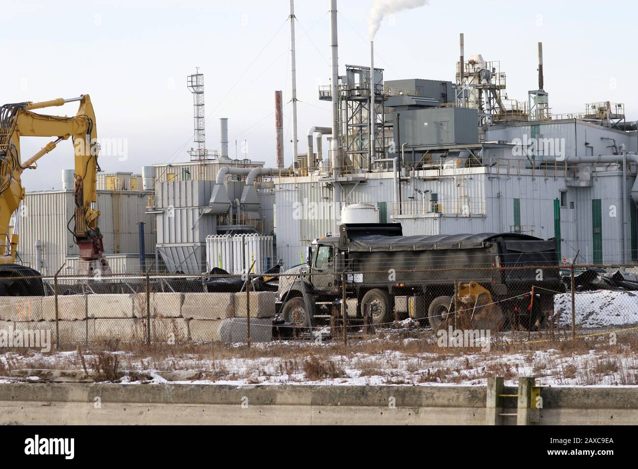 Truck inside factory compound Stock Photo - Alamy