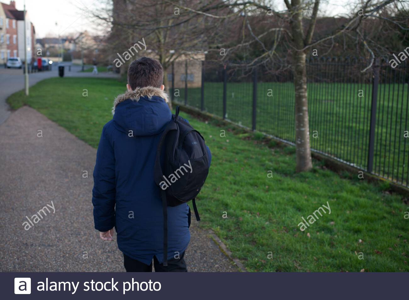 School Boy Walking High Resolution Stock Photography and Images - Alamy