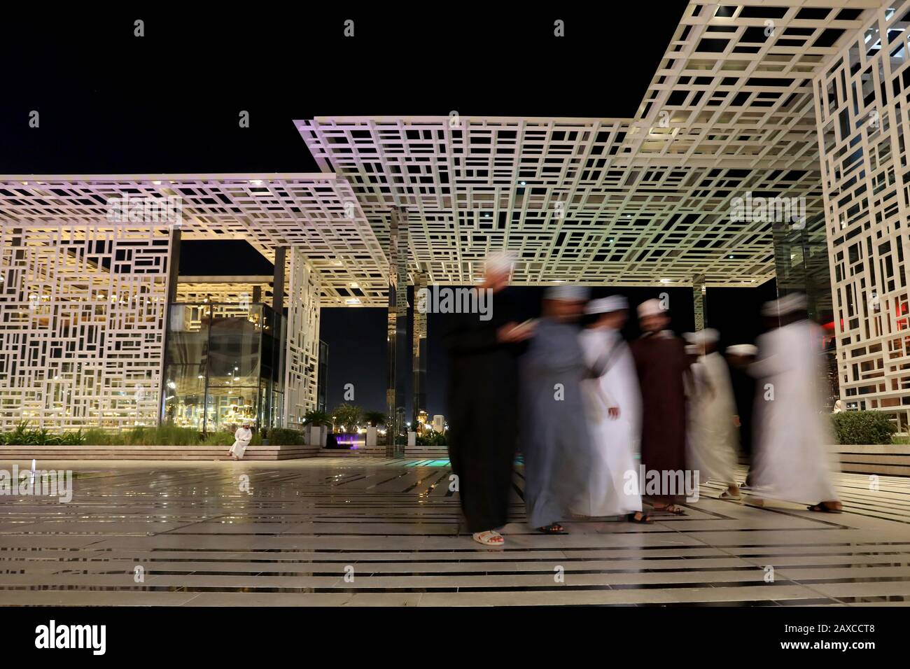 Muscat / Oman – February 11, 2020: Locals take an evening stroll ...