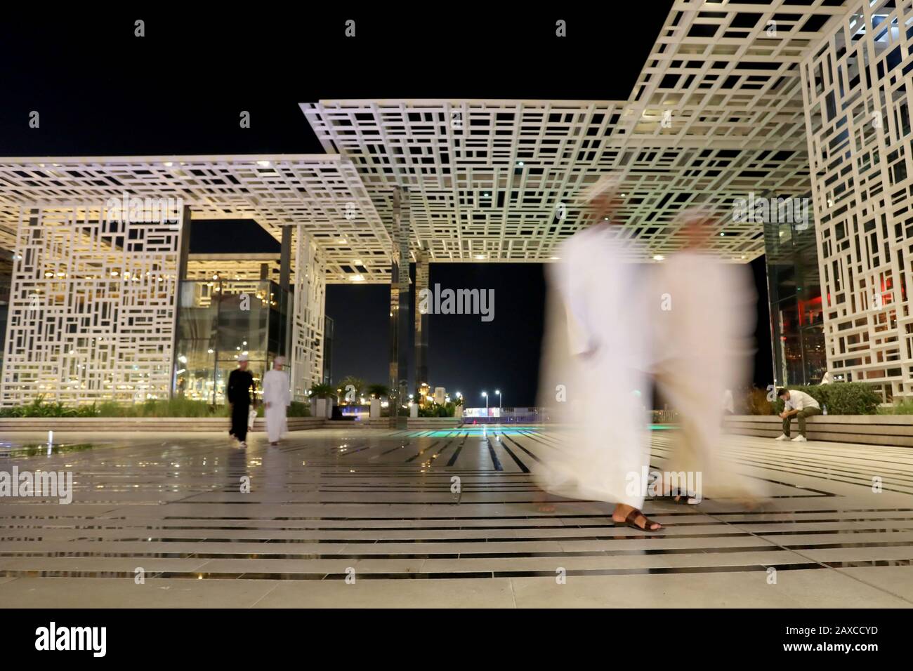 Muscat / Oman – February 11, 2020: Locals take an evening stroll ...