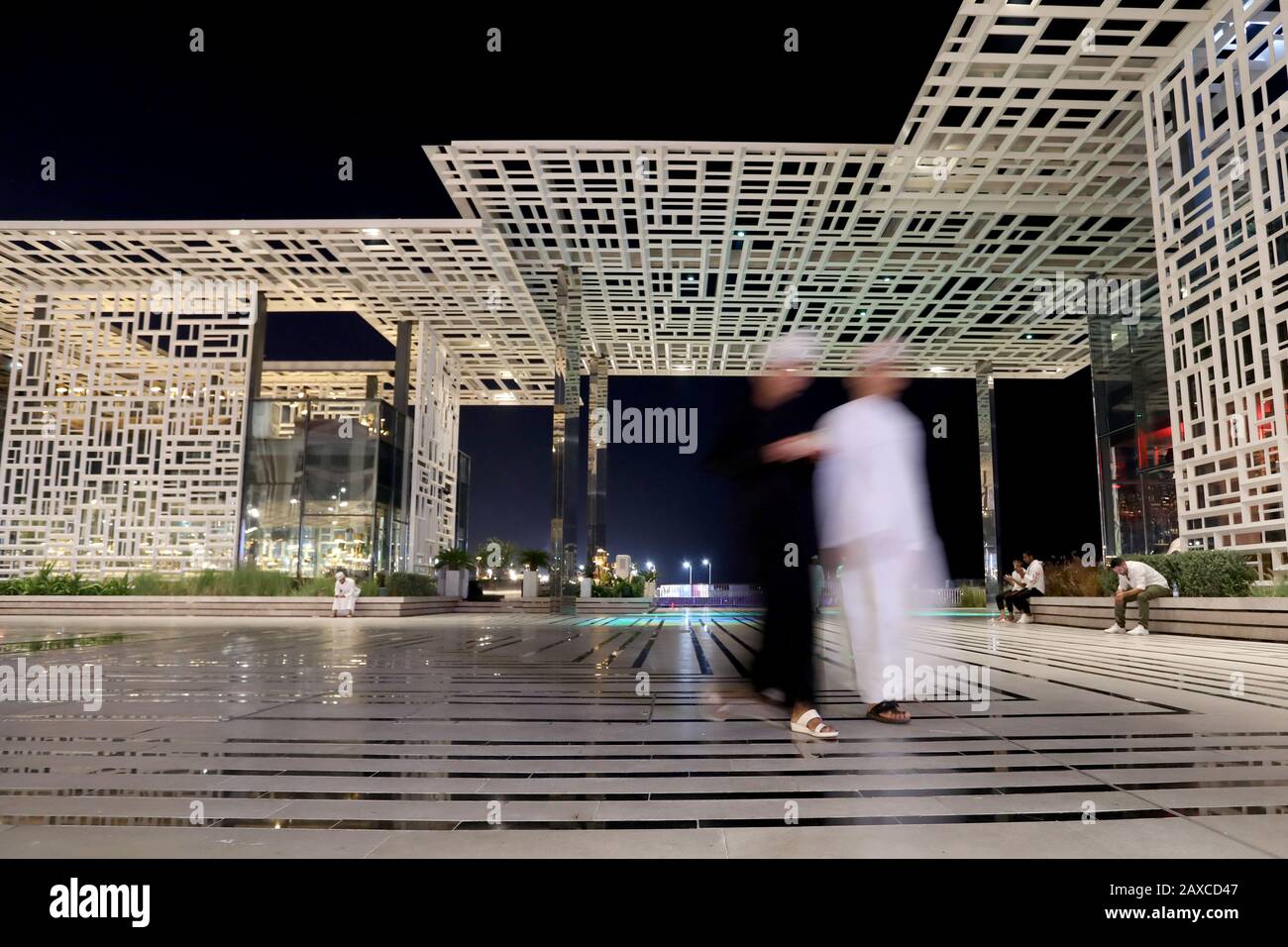 Muscat / Oman – February 11, 2020: Locals take an evening stroll ...