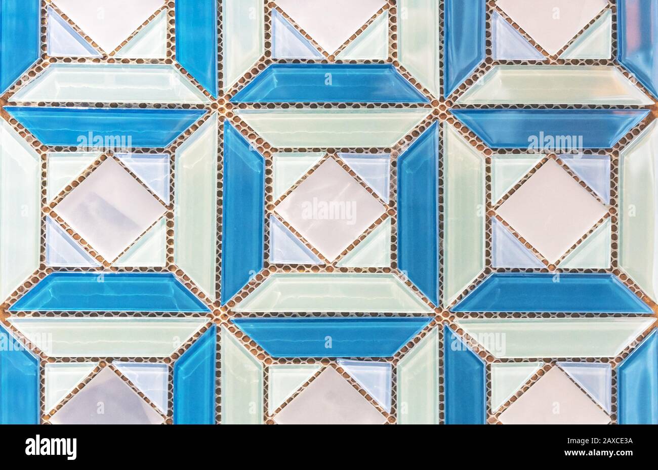Ceramic mosaic with blue, white and light green tiles Stock Photo - Alamy