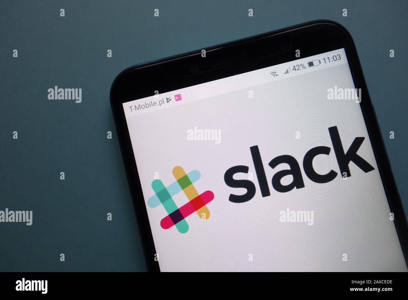 Slack logo on smartphone Stock Photo - Alamy