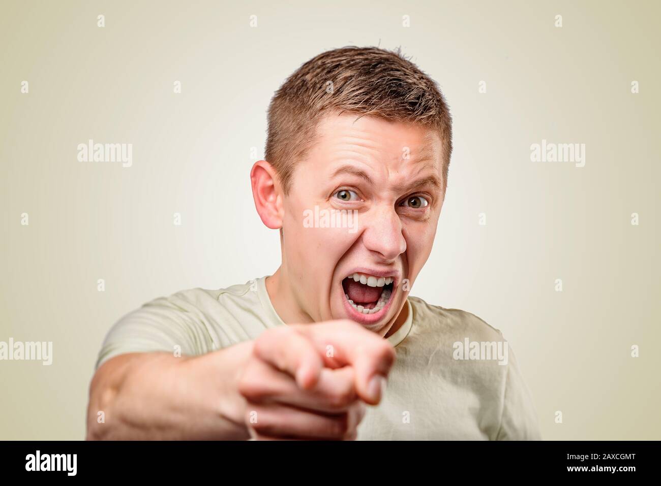 Angry guy yelling finger pointing hi-res stock photography and images ...