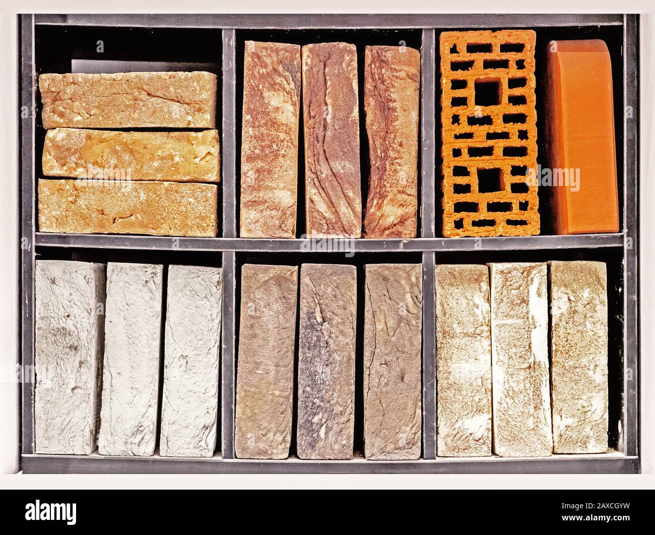 Rack with bricks of different colors. Samples of bricks in a ...