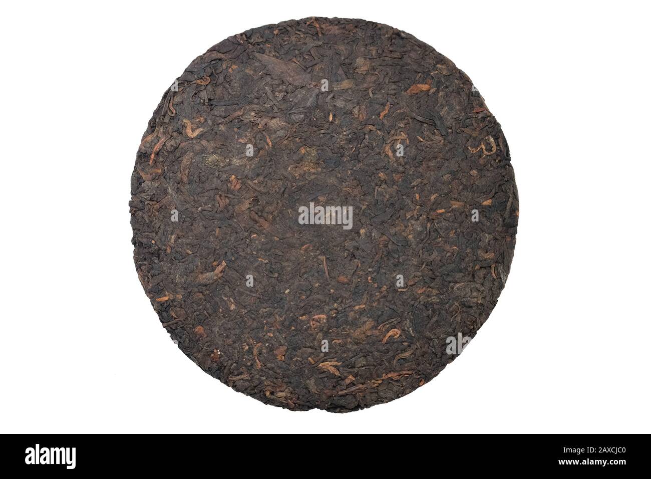 Pressed Chinese puer tea on a white background top view. Pressed ...