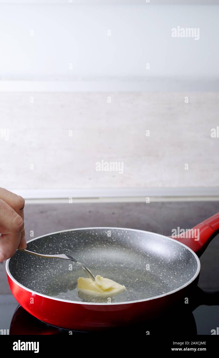 melting butter in a hot pan Stock Photo - Alamy