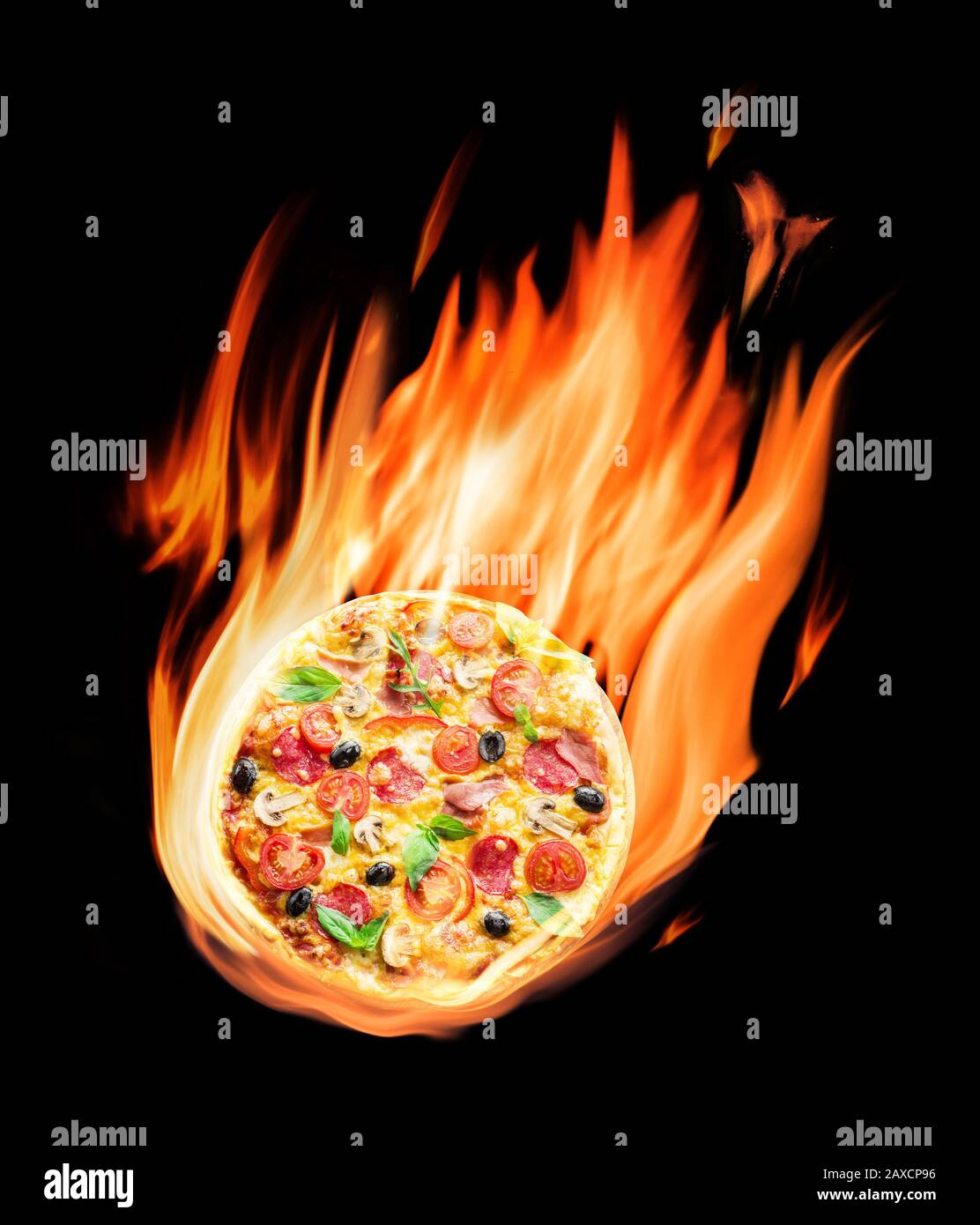 Burning pizza ingredients in flames on the black background Stock Photo ...