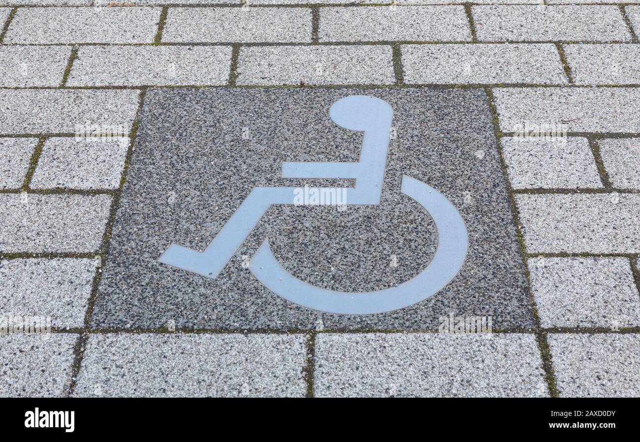 Disabled symbol embedded into car park paving atbirkenhead wirral ...