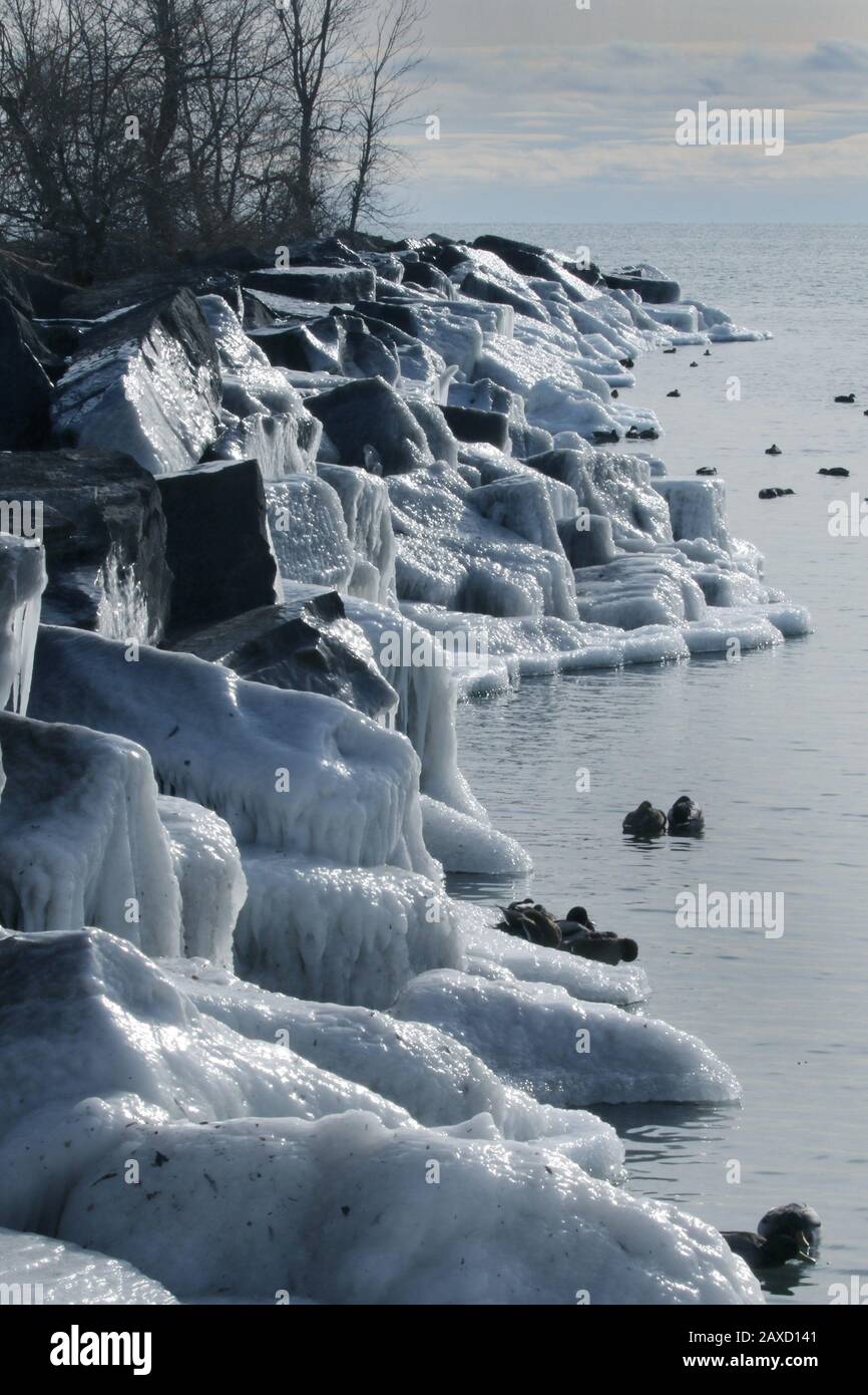 Ice coated shoreline rocks hi-res stock photography and images - Alamy