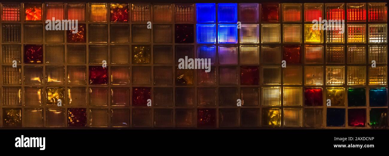 Colorful glass blocks glow in the night Stock Photo - Alamy