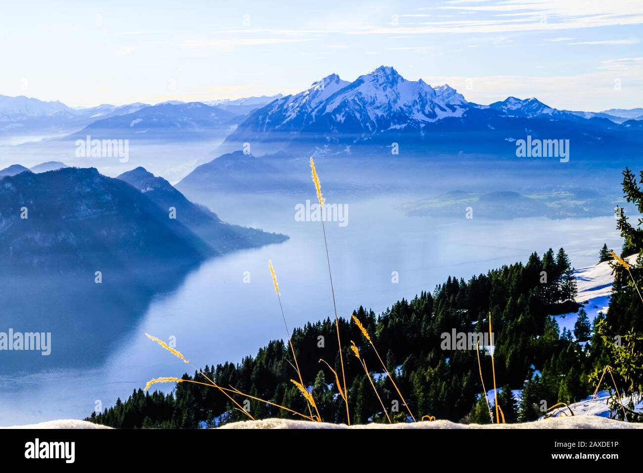 Panaramic skyline view of mount Pilatus imposingly towering over foggy ...