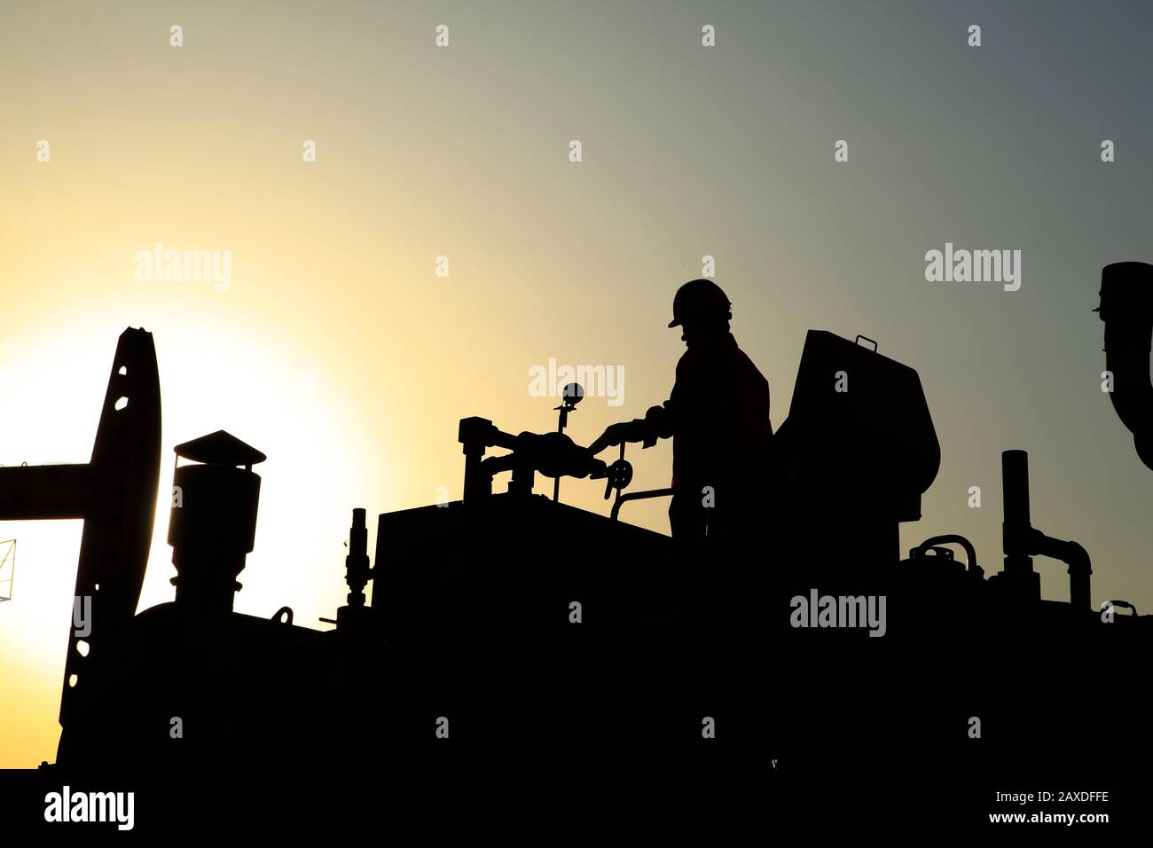oil field, the oil workers are working Stock Photo - Alamy