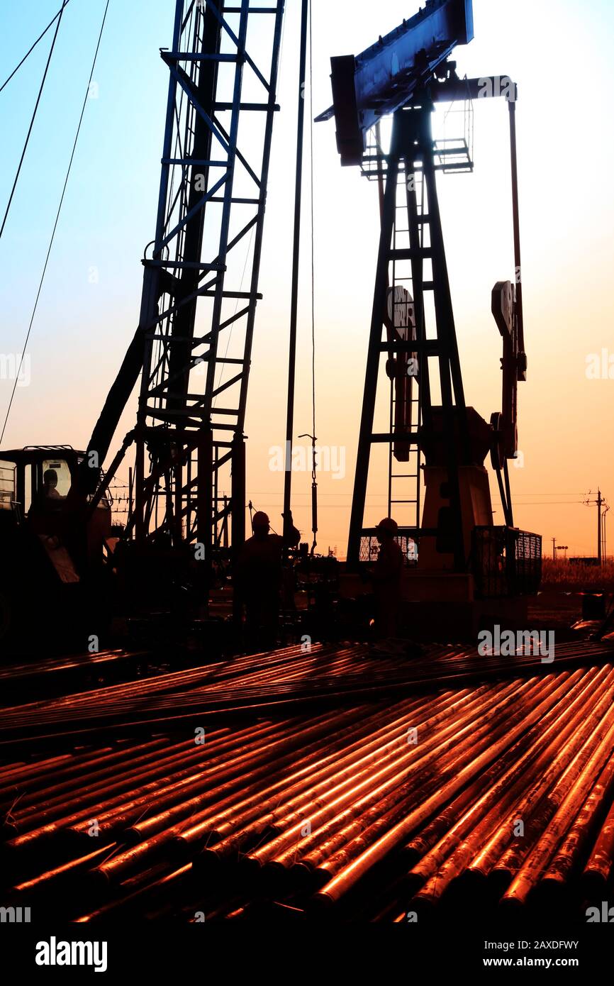 oil field, the oil workers are working Stock Photo - Alamy
