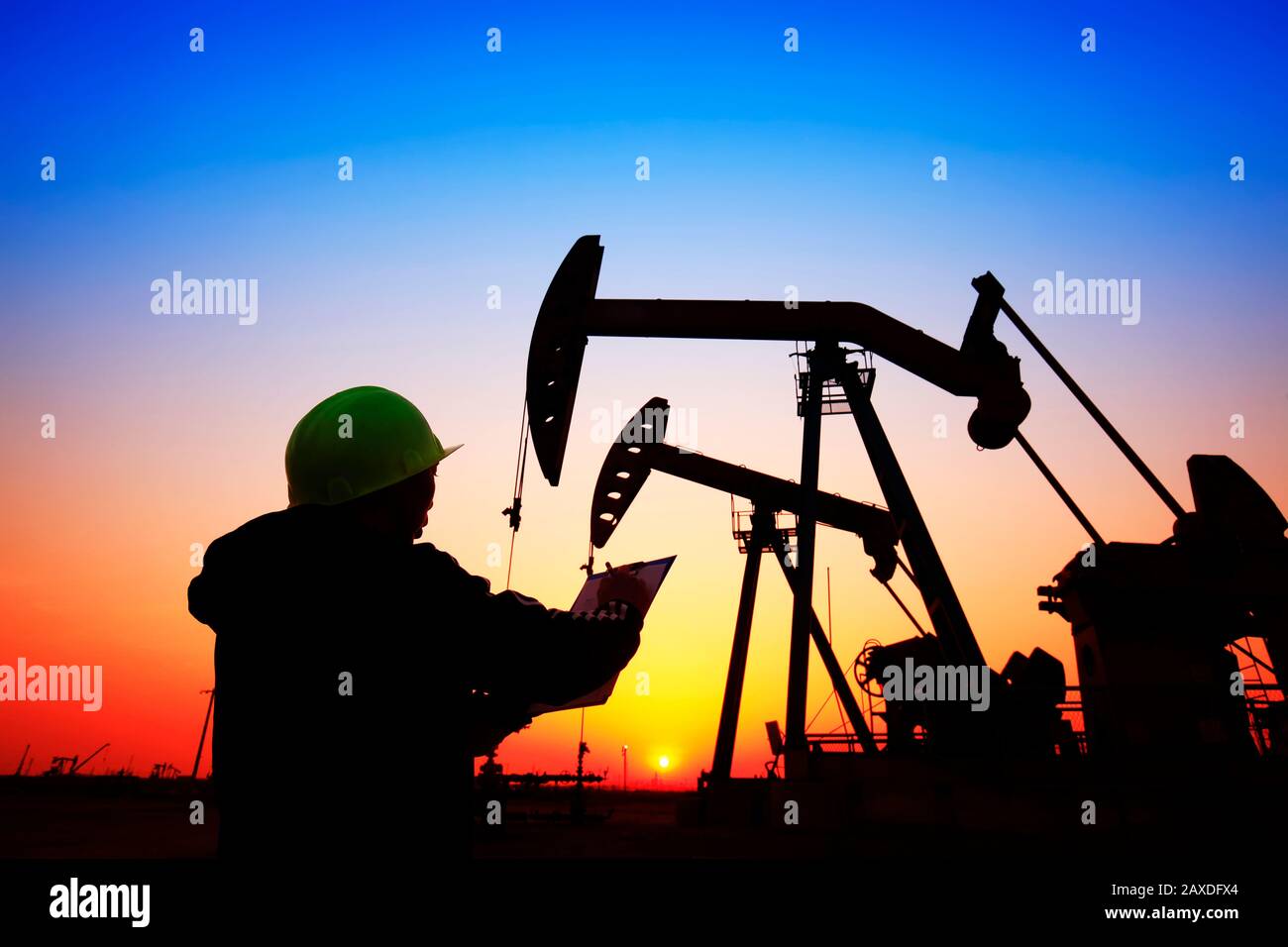 oil field, the oil workers are working Stock Photo - Alamy