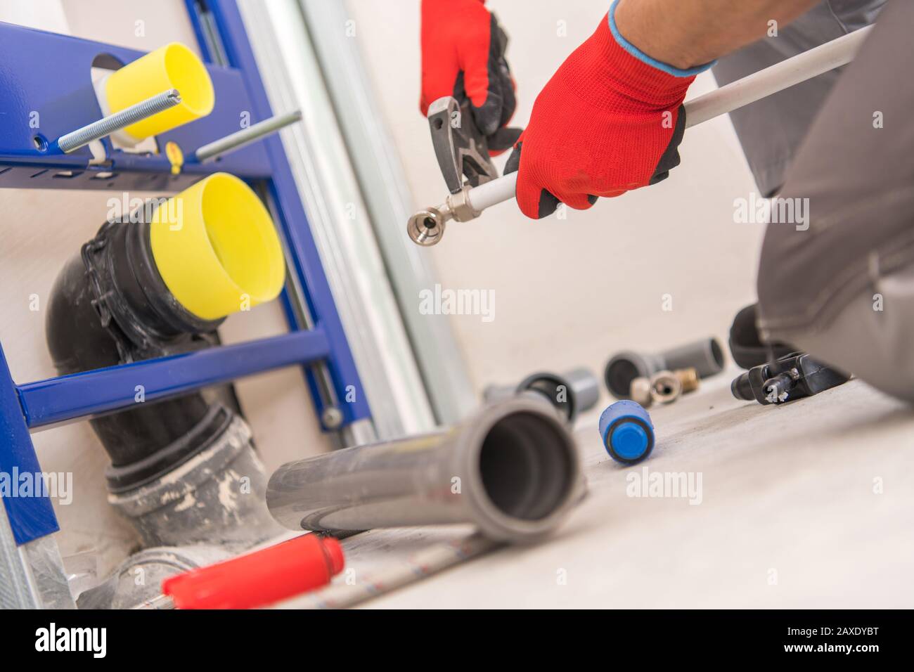 Bathroom and Restroom Plumbing Job. Caucasian Plumber Preparing Water ...