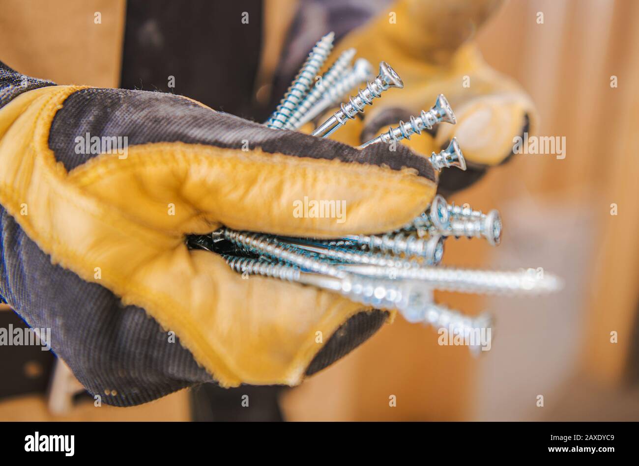 Metal Construction Screws in Workers Hands Closeup Photo. Industrial ...