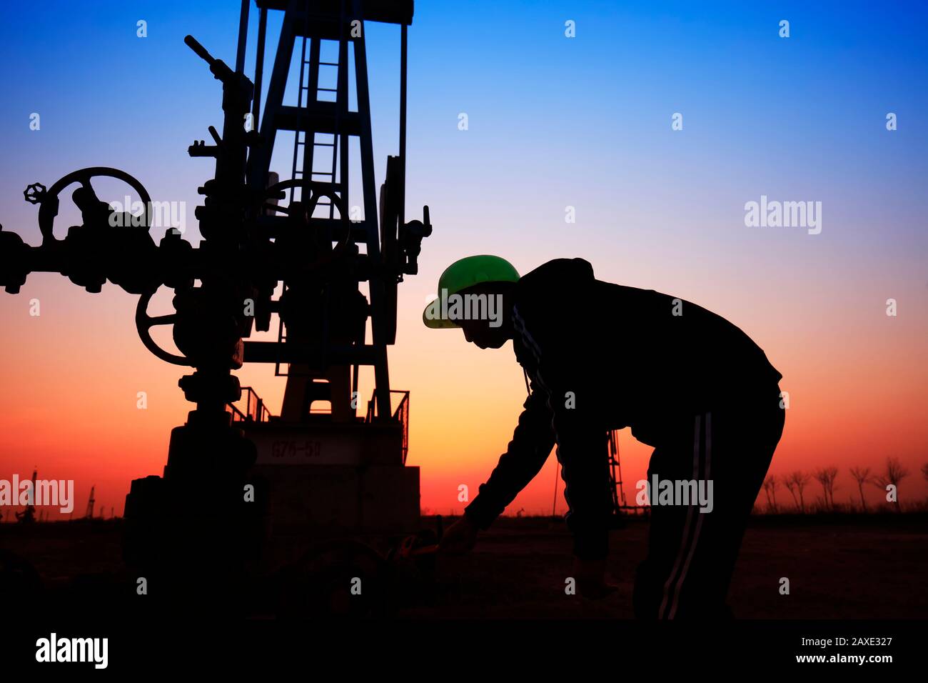 oil field, the oil workers are working Stock Photo - Alamy