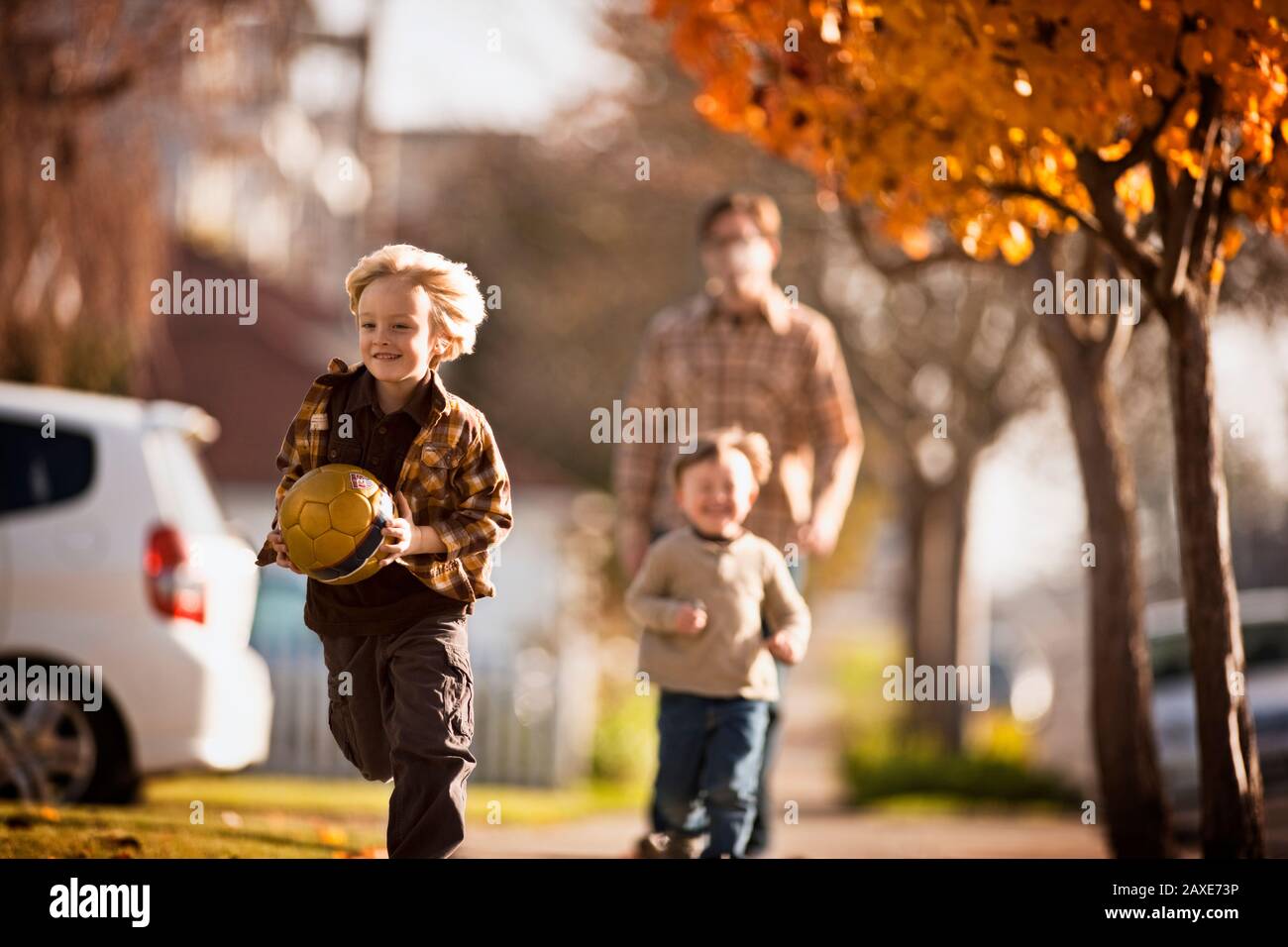 Children suburban street playing hi-res stock photography and images ...