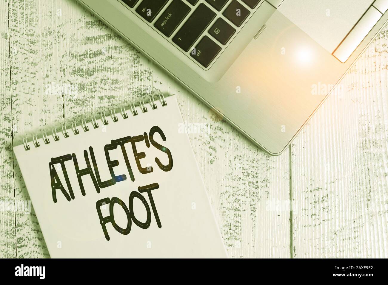 Writing note showing Athlete Foot. Business concept for a fungus ...