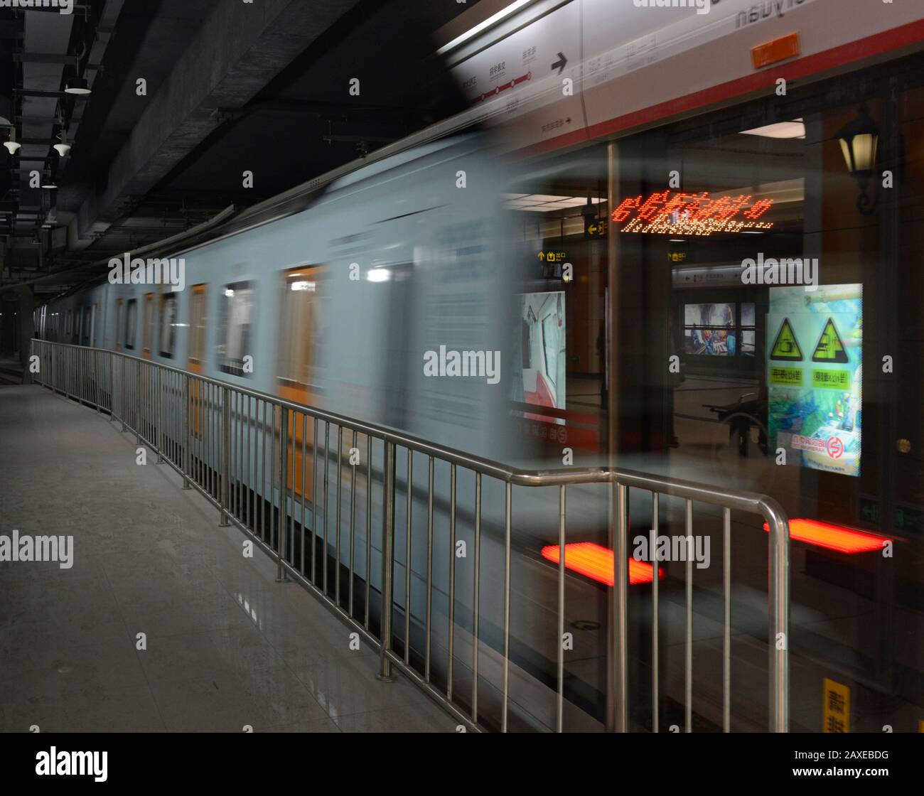 A subway train leaves a station on the Harbin metro system, Harbin ...