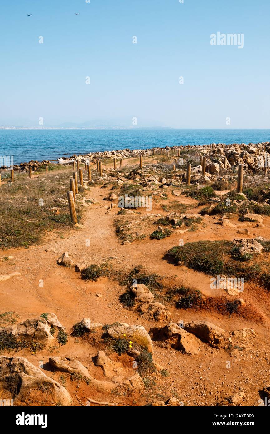 Antibes hike in the Cap d'Antibes bay with coastal cliffs, French ...