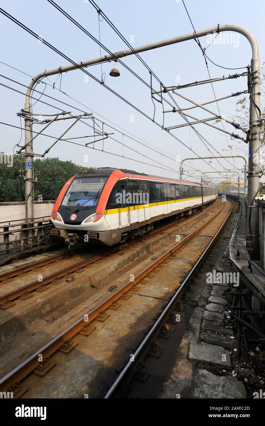 Shanghai metro line 3 train approaches Shilong road station, Shanghai ...