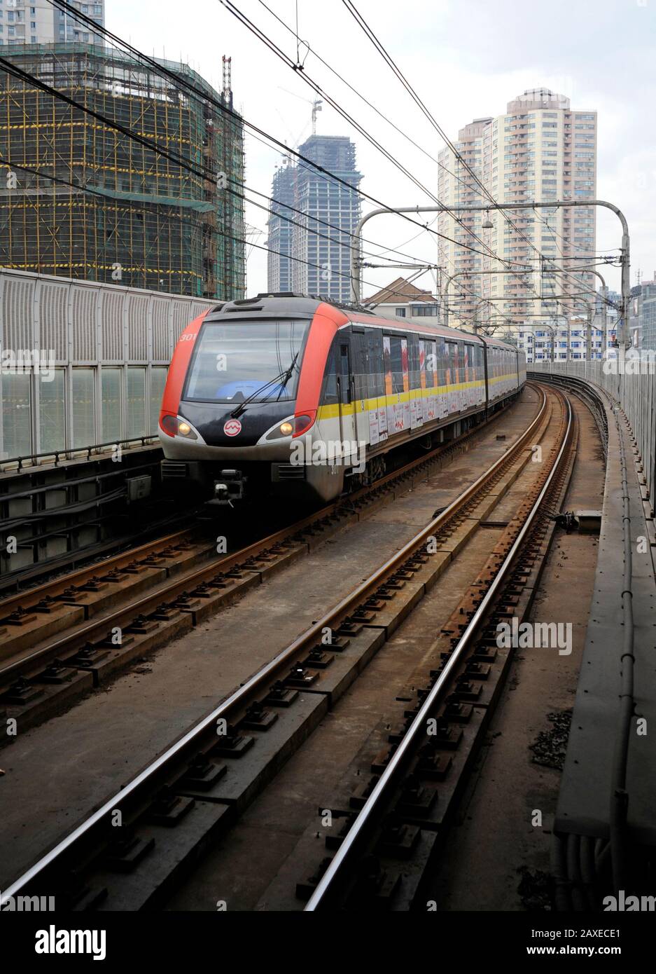 Shanghai metro line 3 approaches a station, Shanghai, China Stock Photo ...