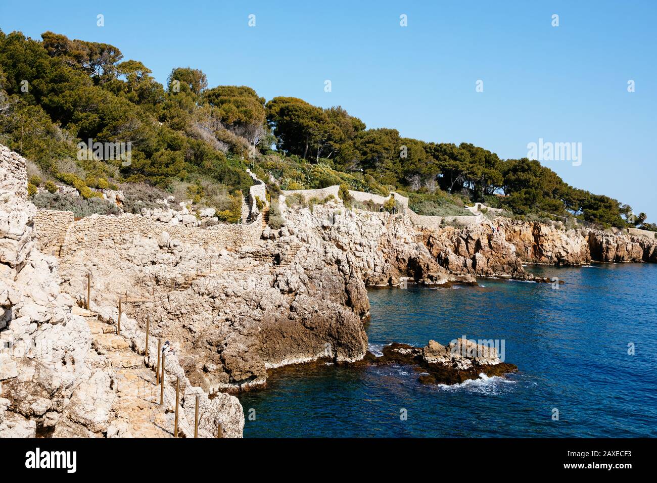 Antibes hike in the Cap d'Antibes bay with coastal cliffs, French ...