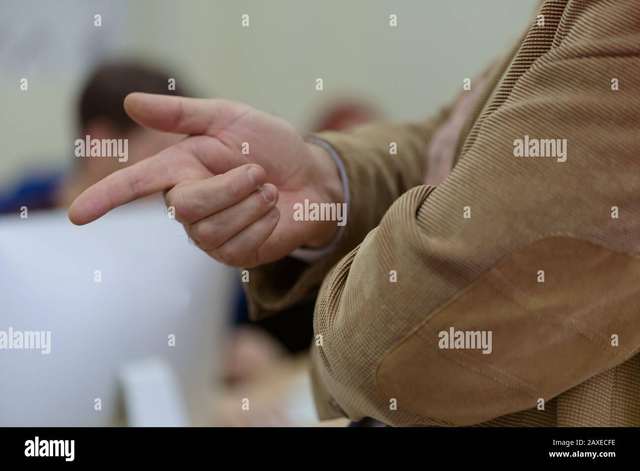 IT technologies teacher at work. IT professor explain lesson to ...