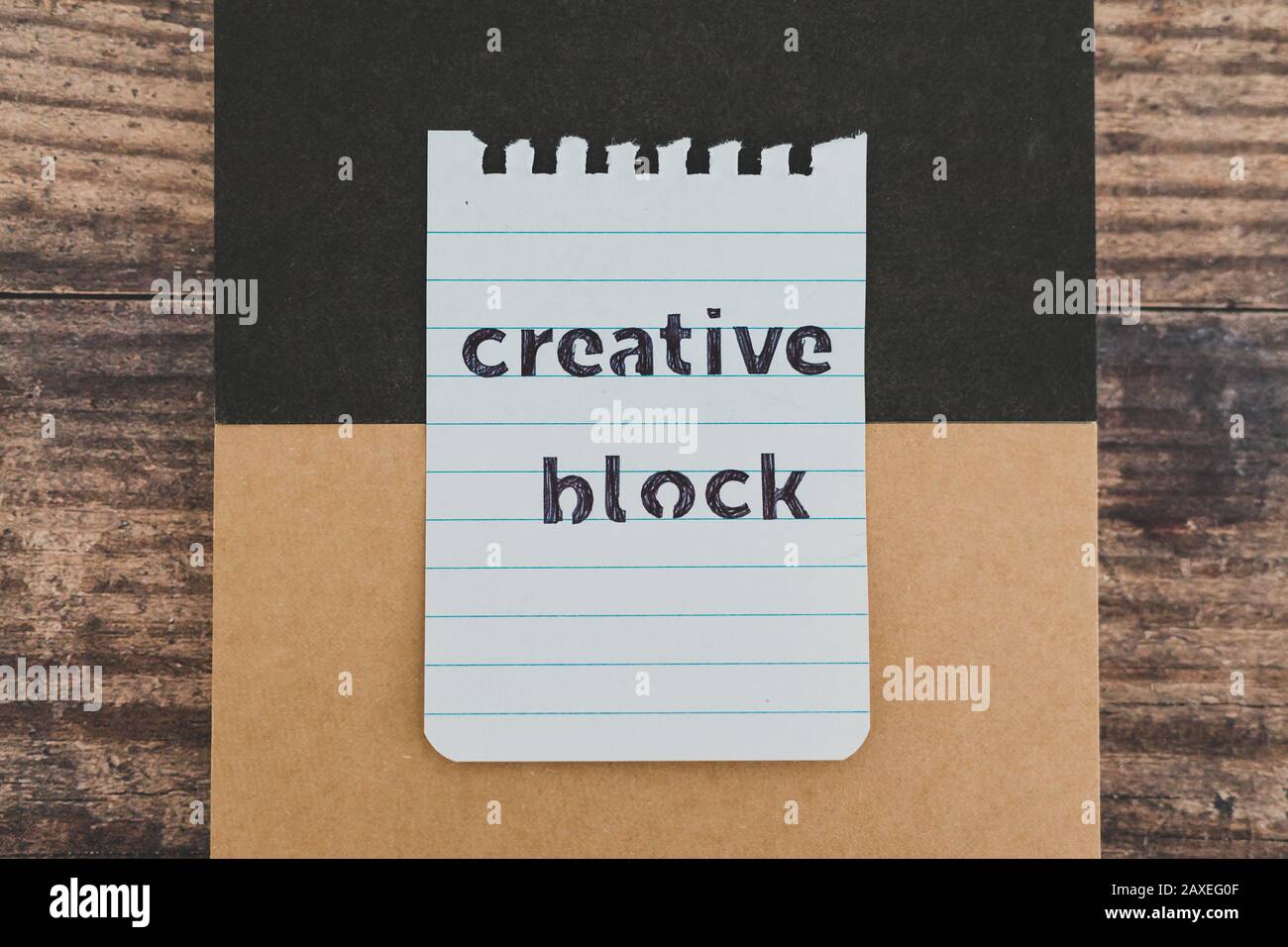 creative block or writer's block conceptual still-life, notepads on ...