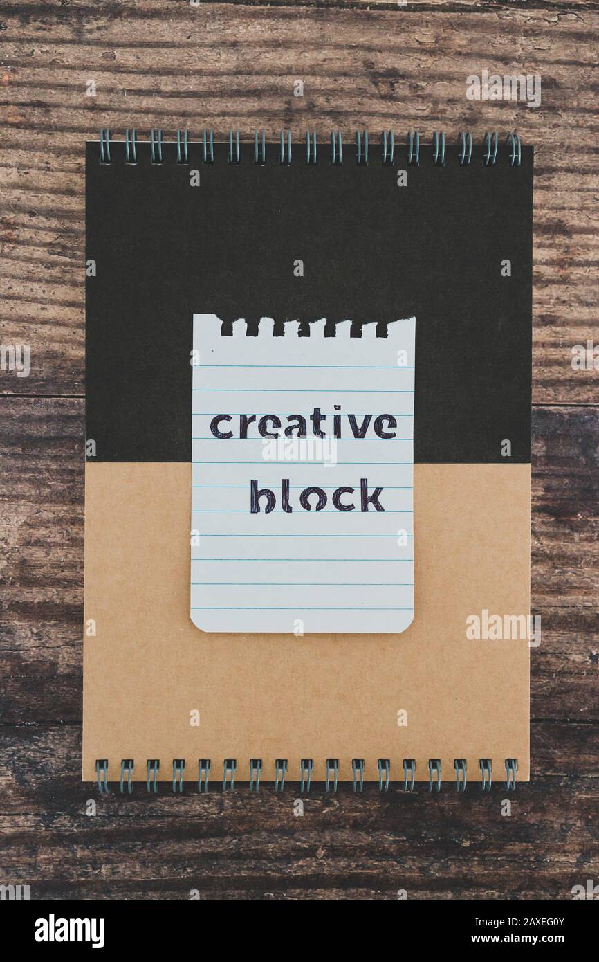 creative block or writer's block conceptual still-life, notepads on ...