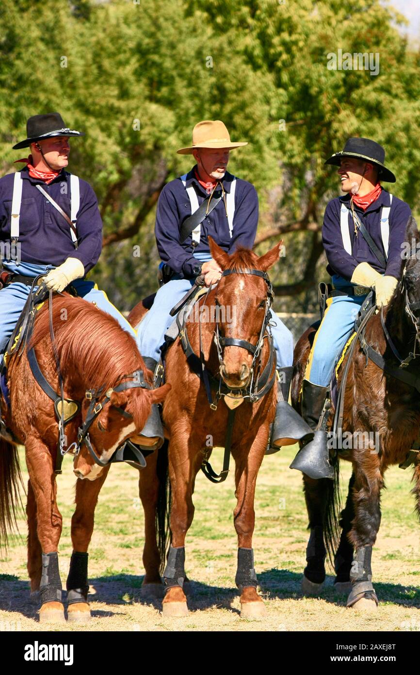 Renactors dressed in the uniform of the 1880s US Army soldiers in the ...