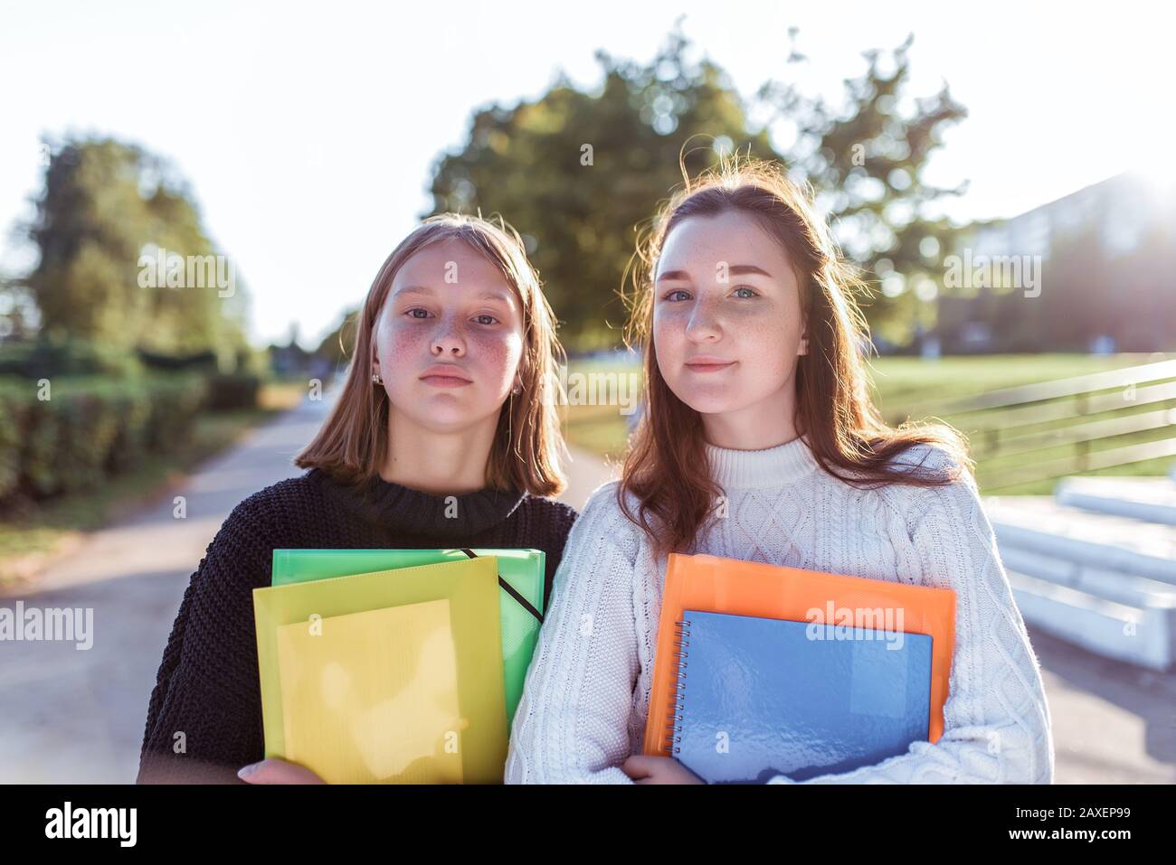 Two girls schoolgirl girlfriends 12-14 years old, summer portrait in ...