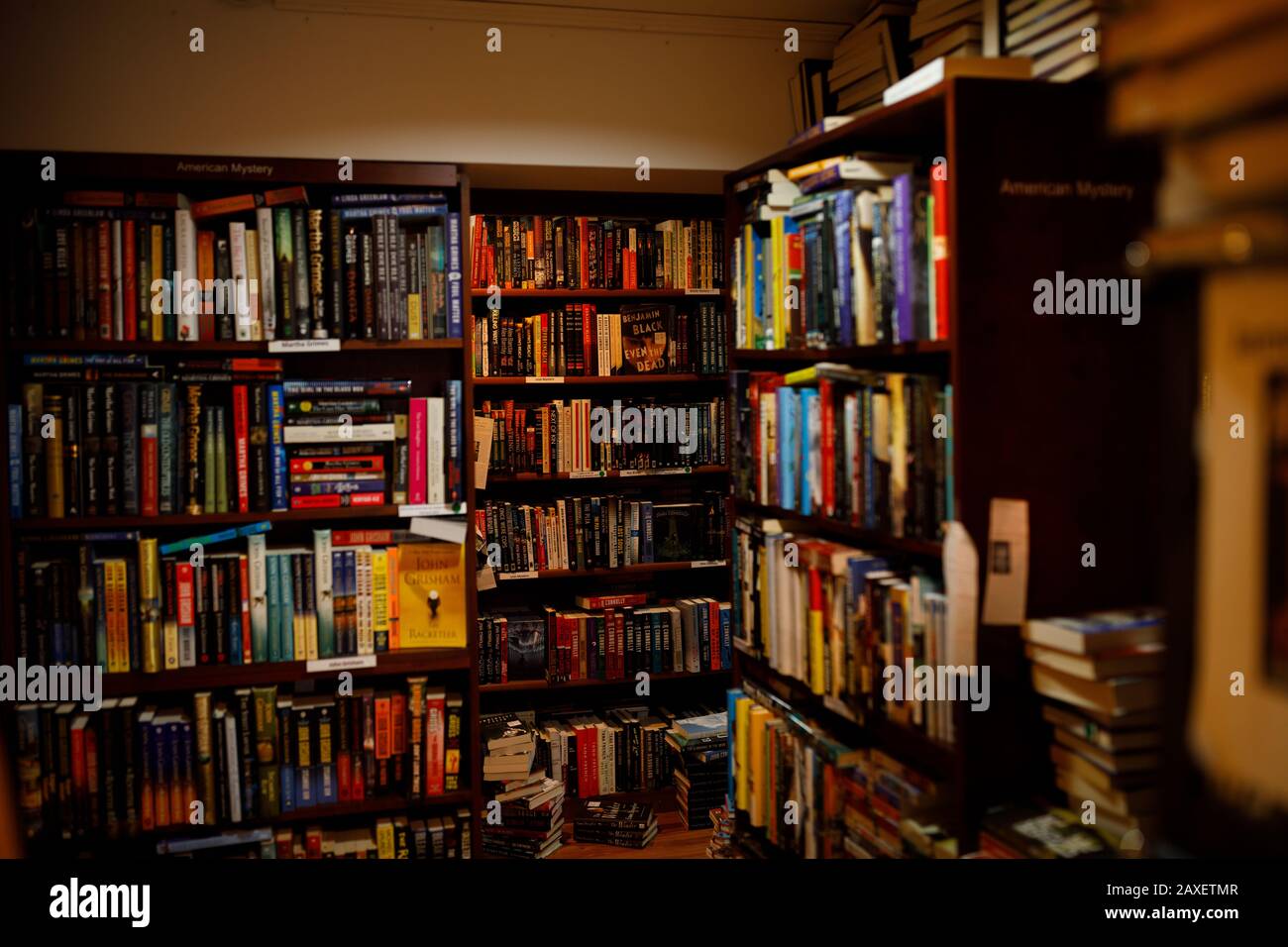 Unorganised book store with piles of books on the shelves Stock Photo ... Unorganised book store with piles of books on the shelves Stock Photo ...
