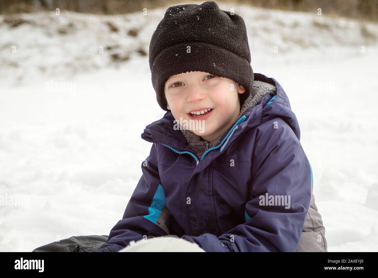 Smiling kid in jacket hi-res stock photography and images - Alamy