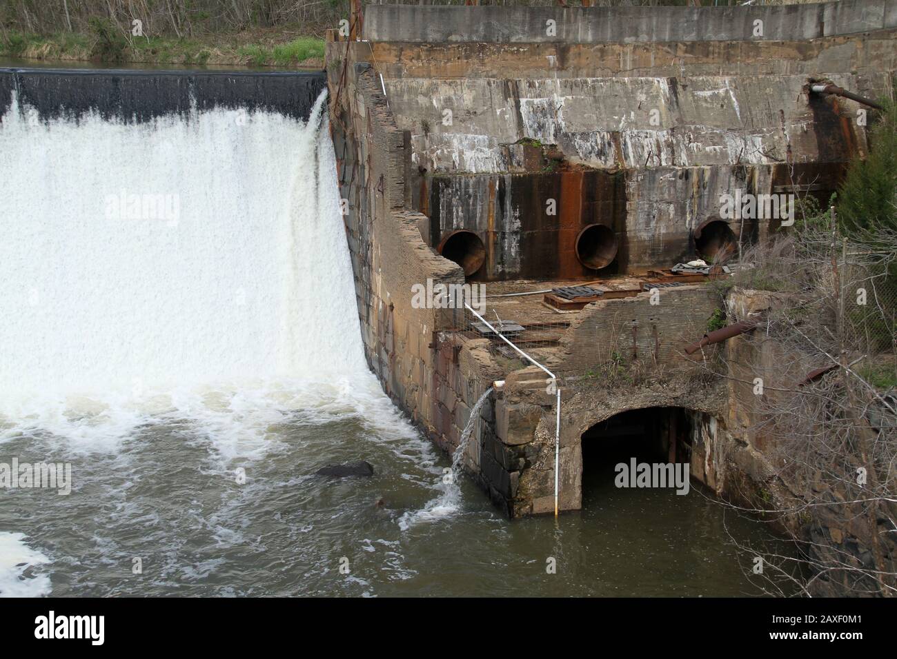 The old dam on Rockfish River near Schuyler, VA, USA. Powerhouse ...