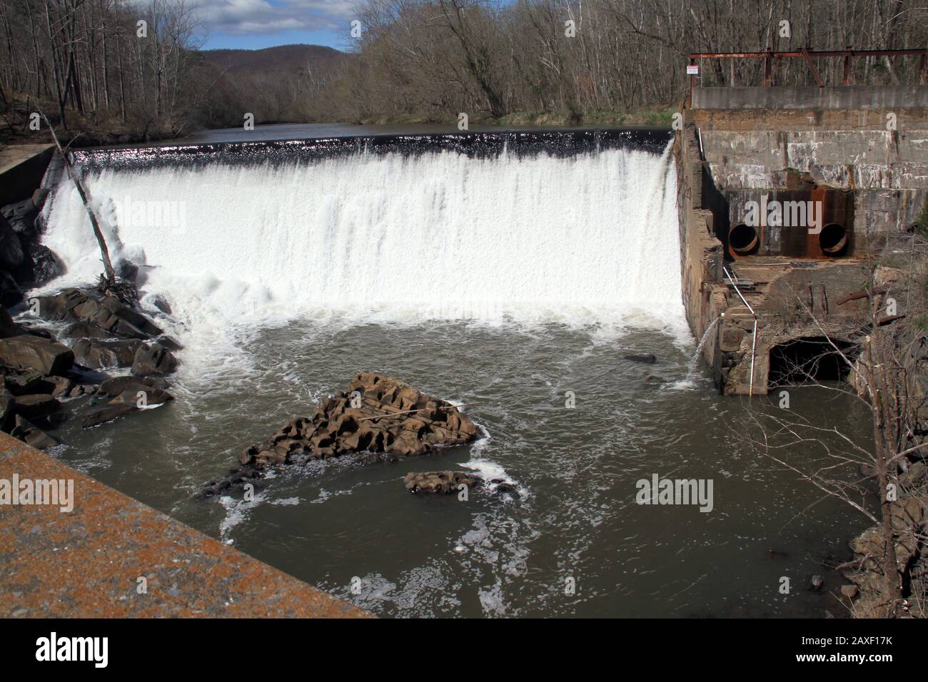 The old dam on Rockfish River near Schuyler, VA, USA. Powerhouse ...