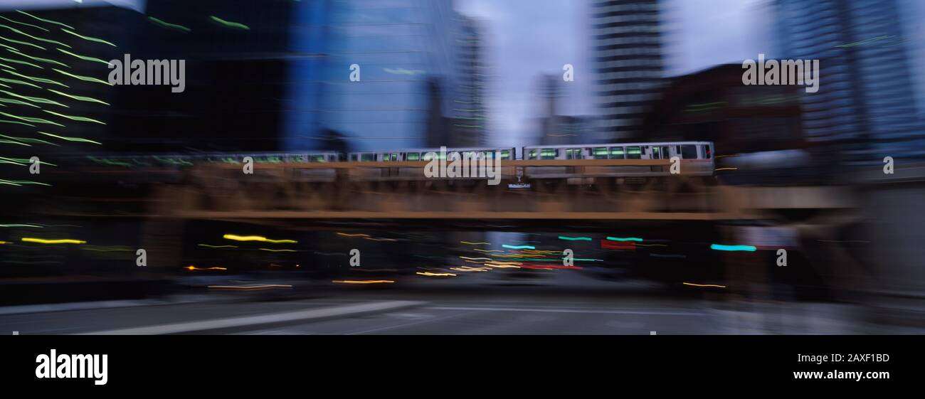 Electric train crossing a bridge, Chicago, Illinois, USA Stock Photo ...