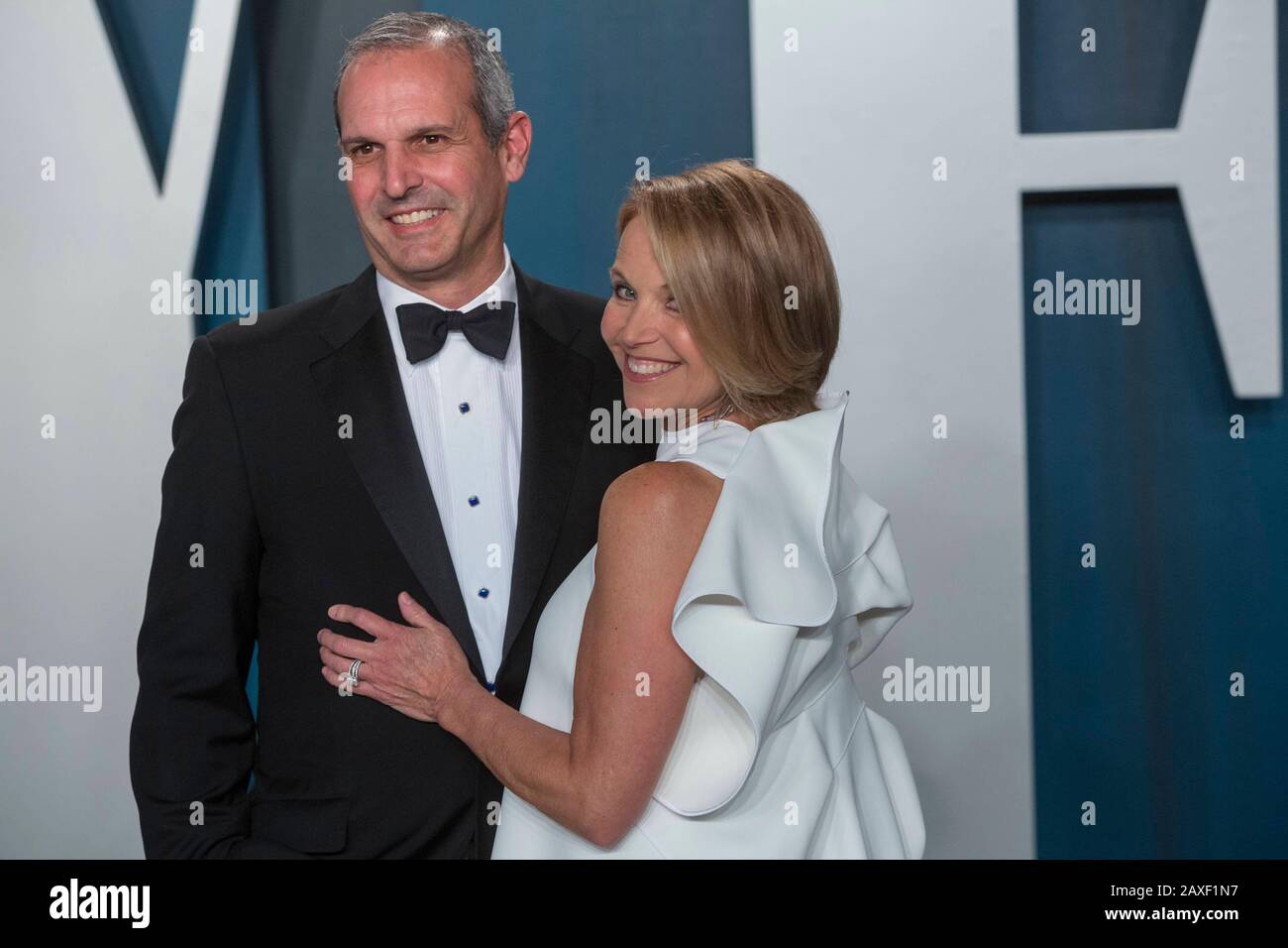 John Molner and Katie Couric attend the Vanity Fair Oscar Party at ...