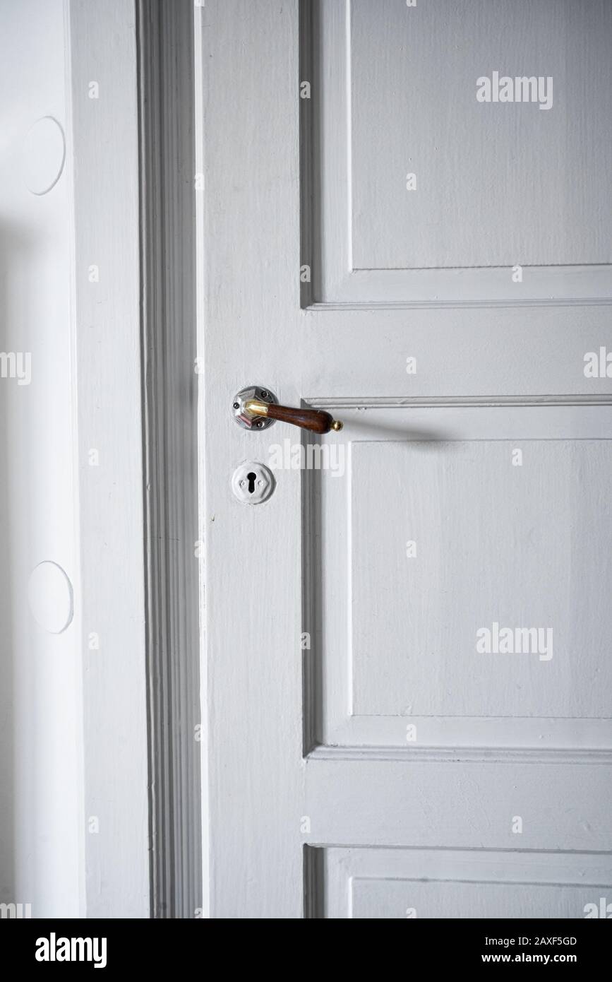 Vintage door with antique door handle Stock Photo - Alamy