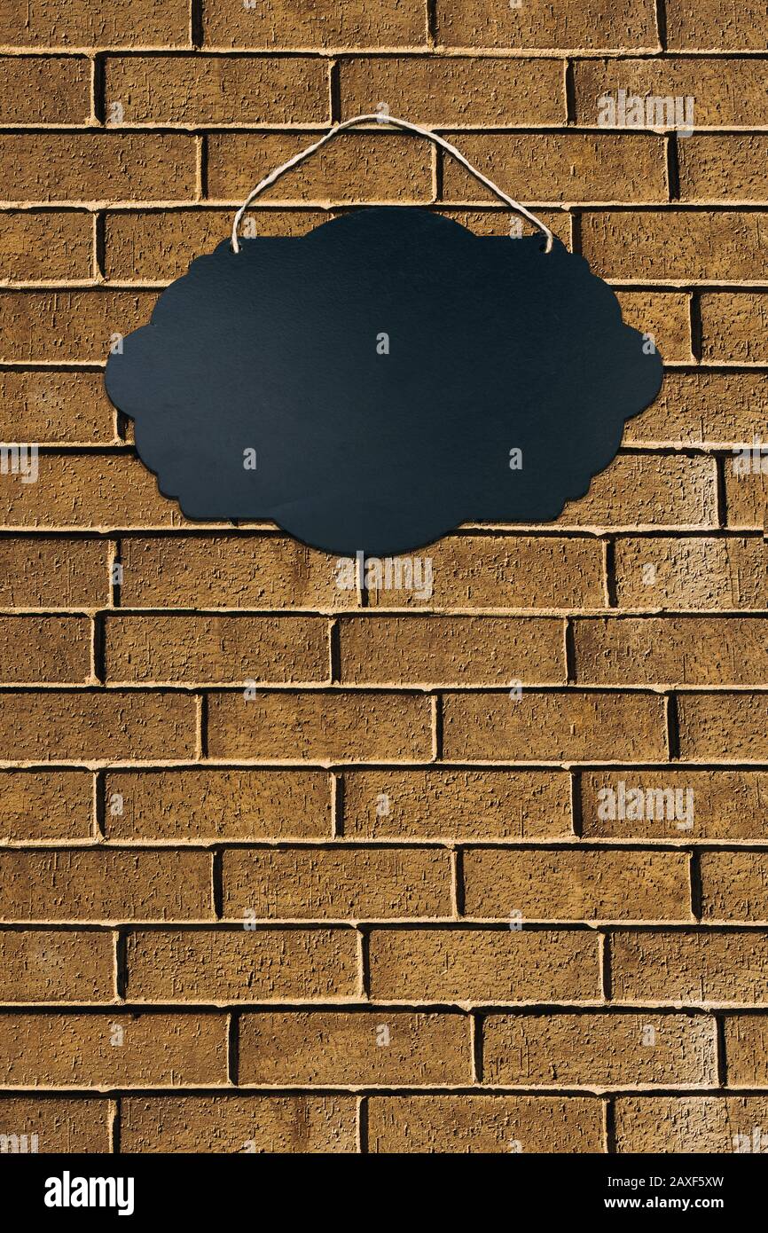 Black Empty Sign Board with string for hanging on wall Stock Photo - Alamy