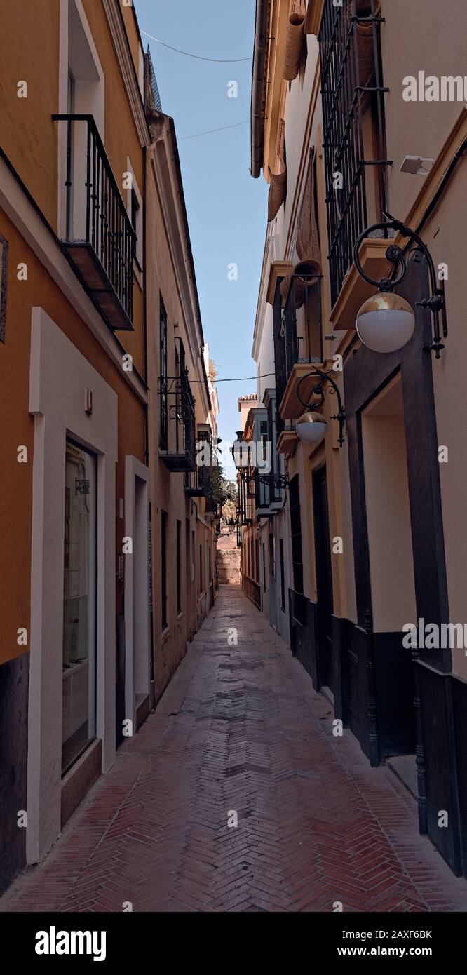 Vertical shot of a narrow passageway between two buildings Stock Photo ...