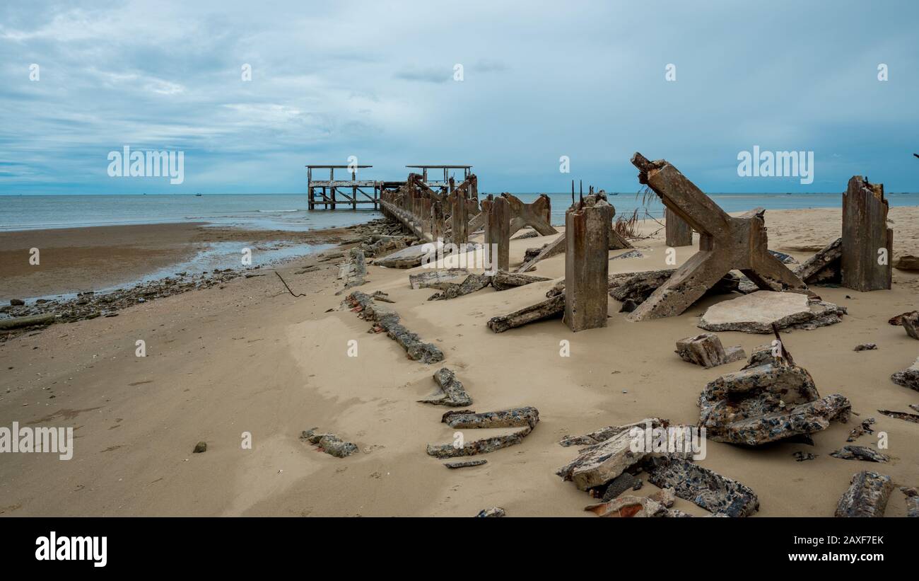Dilapidated old fishing dock collapsing into the sea in Pak Nam Pran on ...