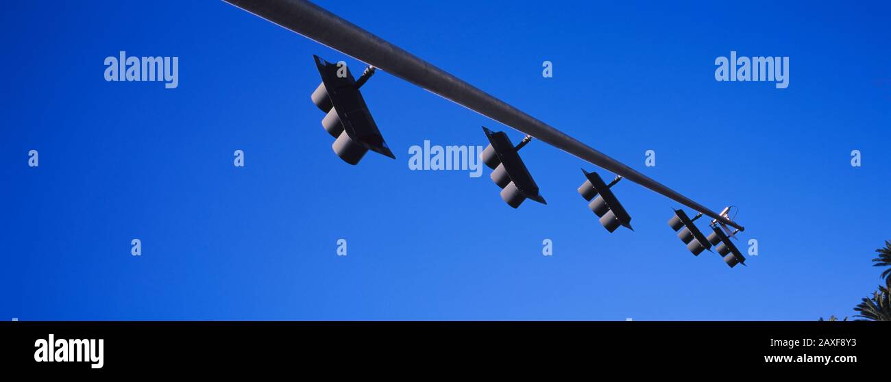 Low angle view of a row of traffic lights on a pole Stock Photo - Alamy