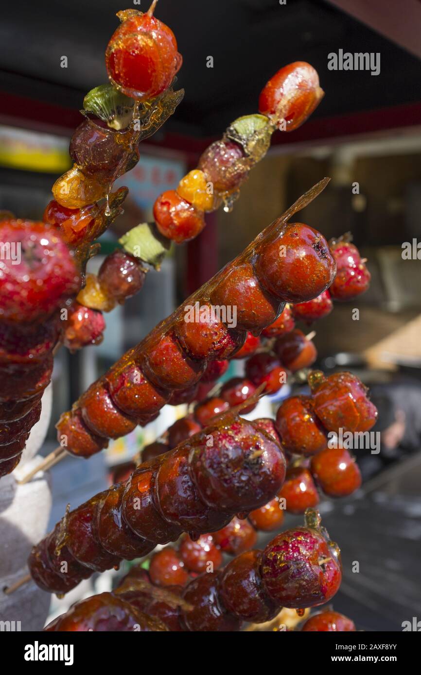 Candied chinese hawthorns hi-res stock photography and images - Alamy