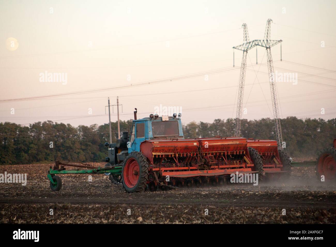 Agricultural mechanical seeders of grain crops. Tactor with a seeder ...