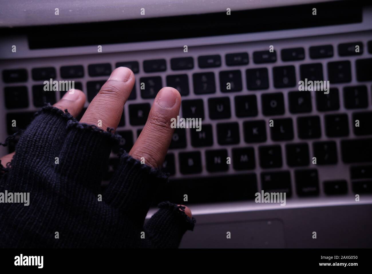 hacker hand stealing data from laptop, close up Stock Photo - Alamy