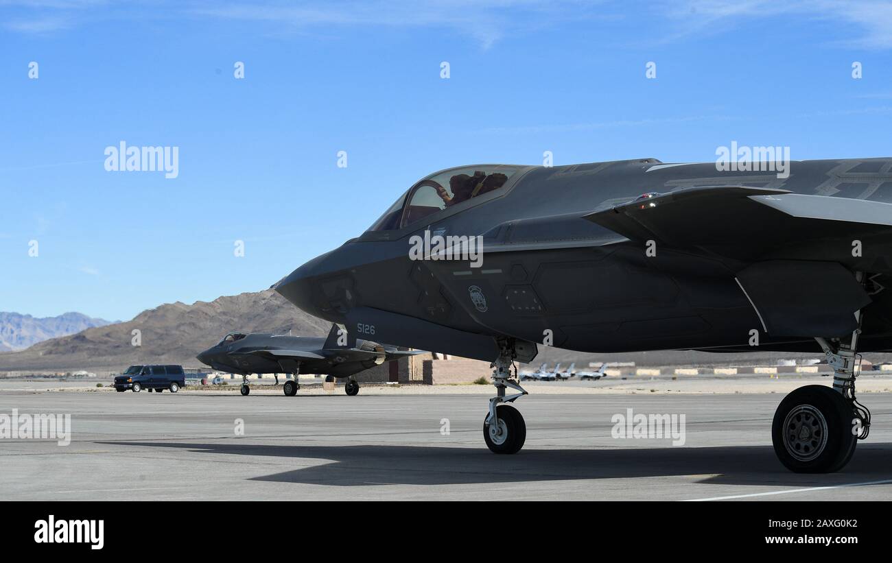 F-35A Lightning IIs assigned to the 421st Fighter Squadron taxi during Red Flag 20-1 at Nellis ...