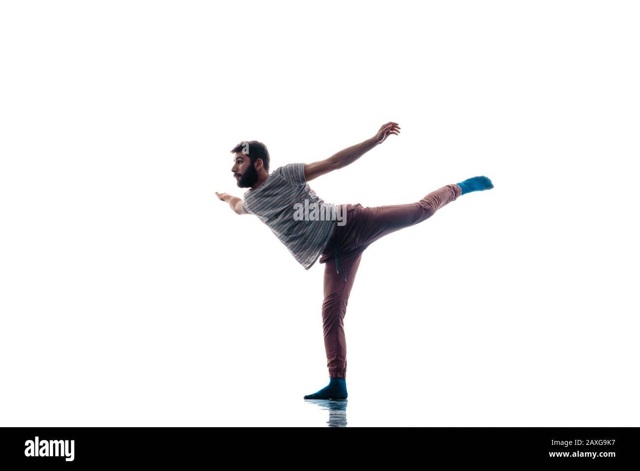 Slender flexible dance performer during a dance practice Stock Photo ...